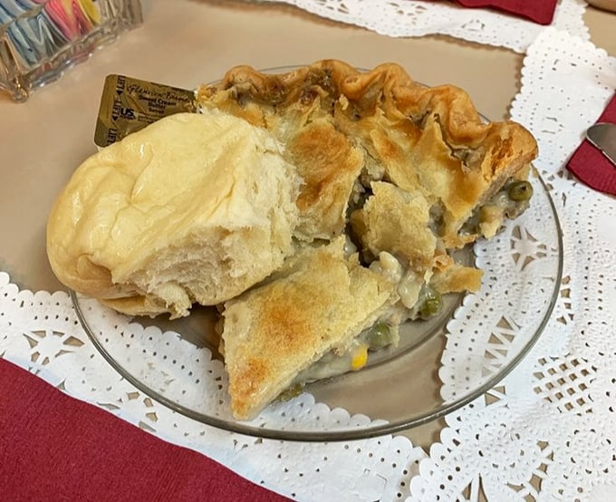 This chicken pot pie isn't just comfort food—it's a warm hug on a plate. That golden dome of pastry promises savory treasures beneath.