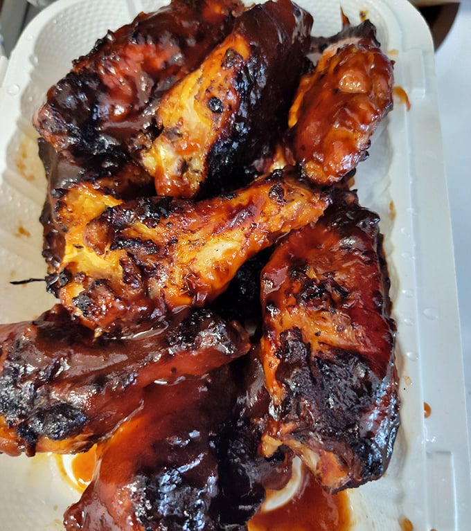These chicken wings have clearly been introduced to smoke and fire by someone who knows exactly what they're doing.