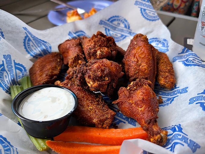 Wings that don't need a sporting event as an excuse. Crispy, seasoned perfection with just the right amount of heat, served with cooling ranch and fresh veggies.
