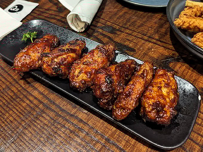 Wood-fired wings with a lacquered glaze that would make furniture makers jealous – these aren't your average sports bar chicken appendages.