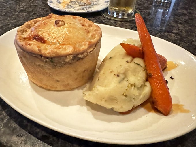 This chicken pot pie doesn't just comfort—it embraces you like a grandmother who thinks you're too skinny, despite all evidence to the contrary.