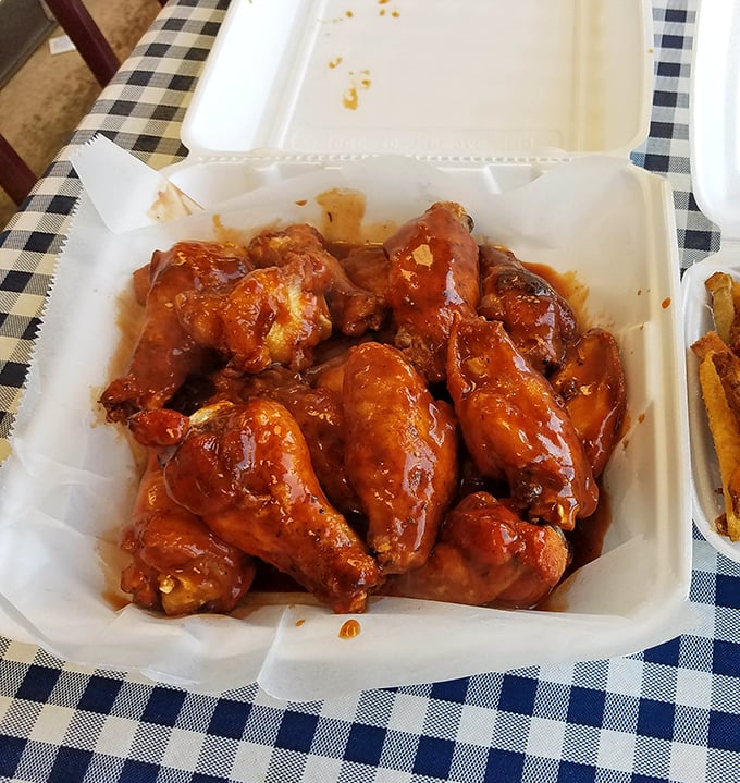 These wings aren't just coated in sauce—they're baptized in it. The kind of messy perfection that justifies the extra napkins.