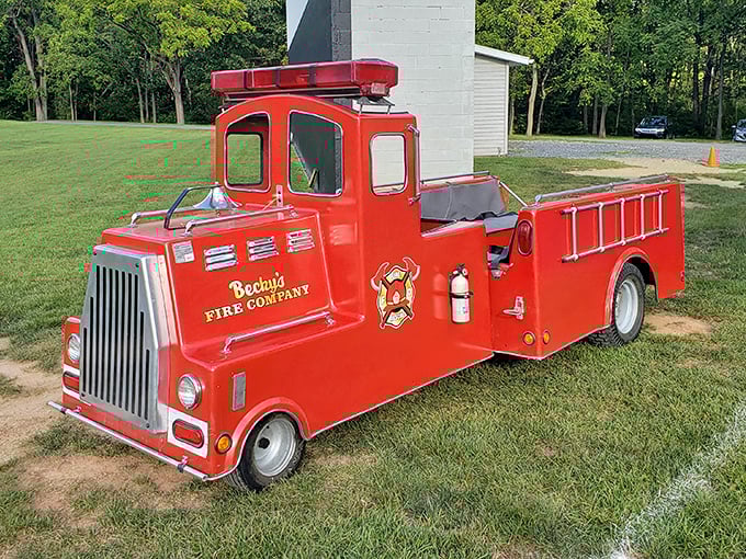 Becky's vintage fire truck stands ready for imaginary emergencies and very real photo opportunities for visitors young and old.