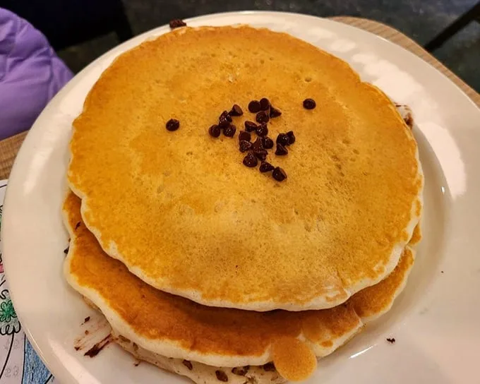 These pancakes don't just have chocolate chips—they've entered a committed relationship with them and neither is looking back.
