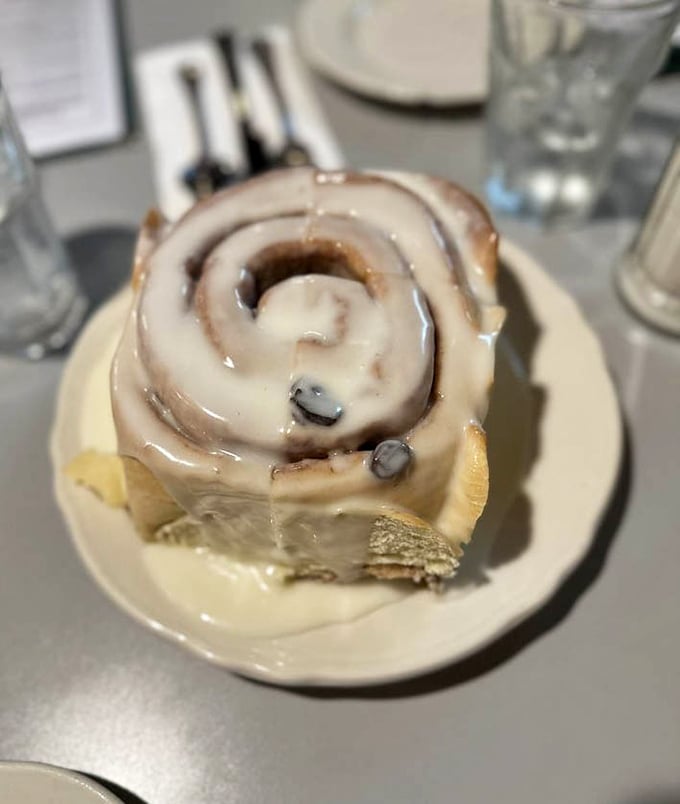 Behold the legendary cinnamon roll, glazed and glistening, roughly the size of a small planet and twice as attractive to anyone with a pulse.