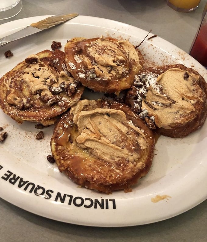 Cinnamon rolls with peanut butter drizzle—because sometimes breakfast needs to taste like your favorite childhood candy bar grew up gloriously.