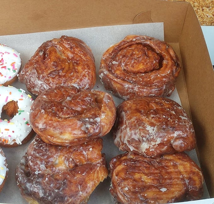 The cinnamon roll box – where spiral-shaped happiness comes glazed and ready to transform any ordinary morning into a celebration.