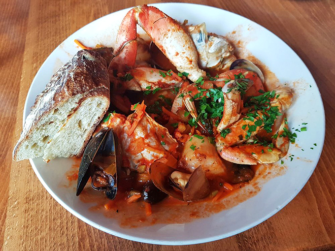 This cioppino isn't just soup – it's a treasure hunt where every spoonful reveals a new seafood surprise.