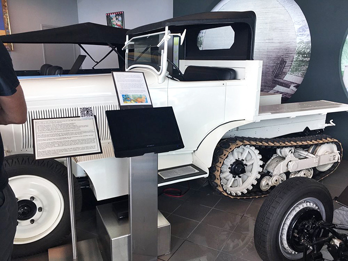 Part car, part tank, all innovation. This white half-track vehicle shows what happens when engineers think beyond conventional transportation solutions.