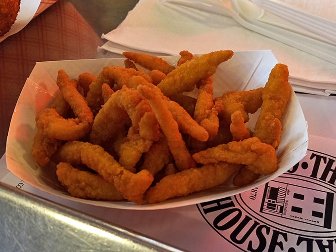 Clam strips that crunch like your favorite childhood memories. These golden morsels are what seafood dreams are made of.