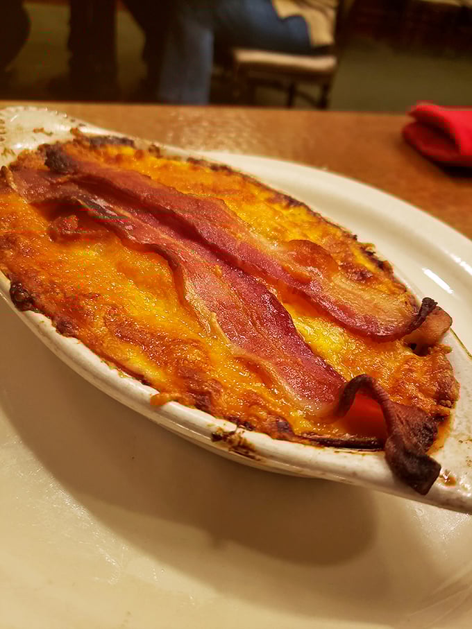Behold the Kentucky Hot Brown in all its glory—a cheesy, bacon-topped masterpiece that makes ordinary casseroles look like they're not even trying.