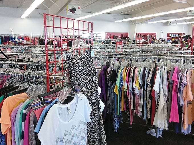 Fashion democracy in action—designer labels hanging shoulder-to-shoulder with everyday brands, all waiting for their second chance at stylishness.