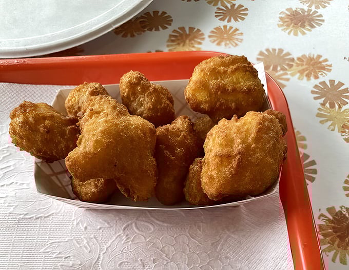 Corn nuggets that crunch like your favorite childhood memory, golden-fried pillows of sweetness that disappear far too quickly.
