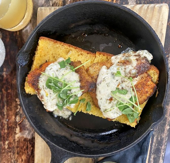 Cornbread served in a cast-iron skillet—because some traditions are worth preserving, especially when they taste this good.