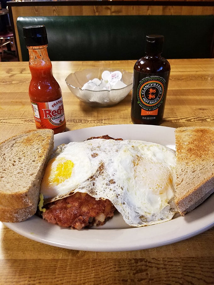 The legendary corned beef hash—where eggs and toast frame the star of the show like the masterpiece it truly is.