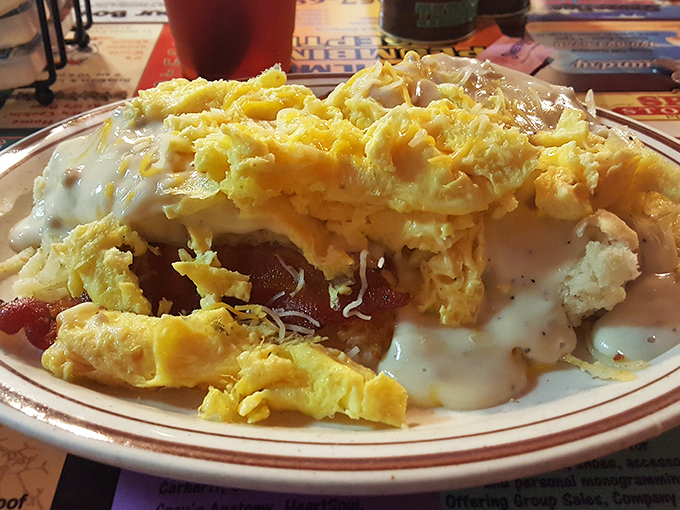 The Country Benedict laughs at traditional eggs Benedict—replacing English muffins with biscuits and hollandaise with country gravy. Arkansas knows best.