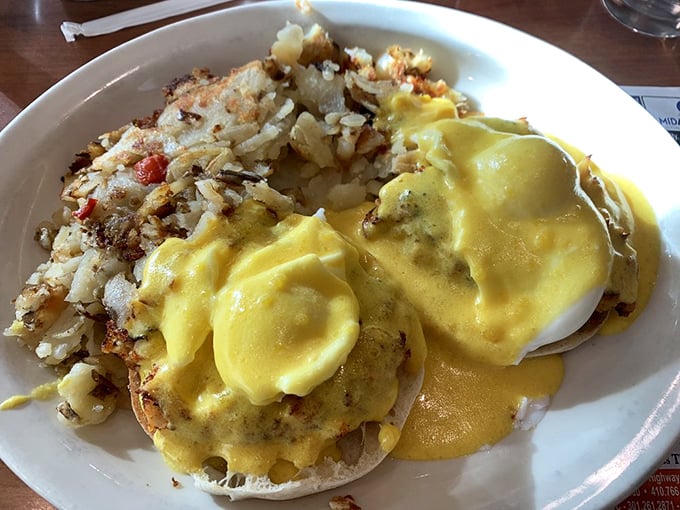 Eggs Benedict gets the Maryland treatment with crab cakes standing in for Canadian bacon – a hollandaise-draped masterpiece that screams "local pride."