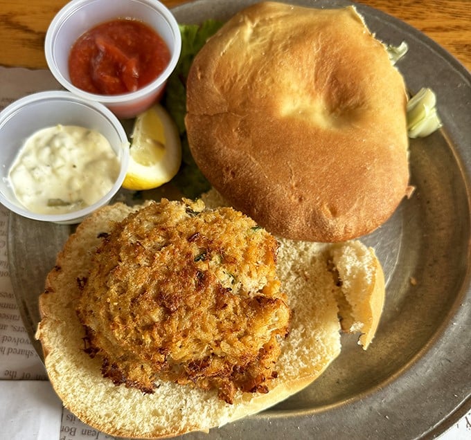 This isn't just a crab cake sandwich—it's Maryland's greatest contribution to humanity, golden-brown and served with the respect it deserves.