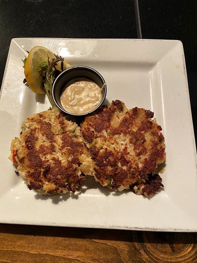 These crab cakes don't mess around with unnecessary fillers—they're like the seafood equivalent of a greatest hits album, all killer, no filler.