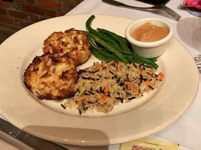Crab cakes that actually taste like crab, not breadcrumb disappointment – what a revolutionary concept!