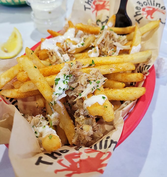 Cajun fries topped with crab meat turn ordinary potatoes into something your cardiologist might frown at but your taste buds applaud.