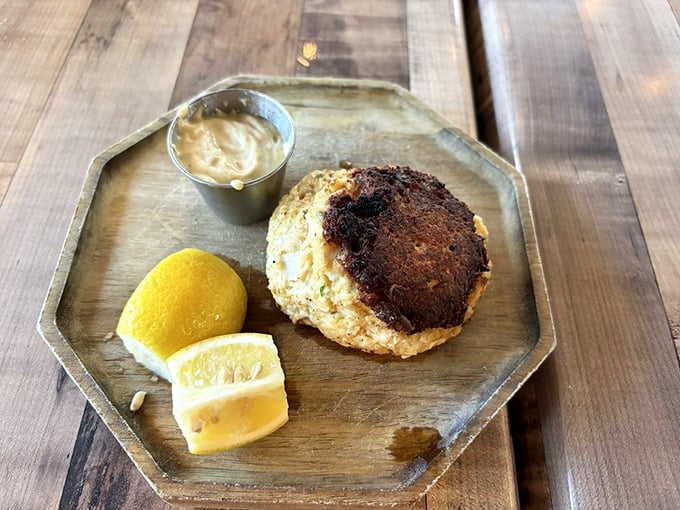 This golden-crusted crab cake isn't playing games – it's all about the sweet lump crab meat with minimal filler and maximum flavor.