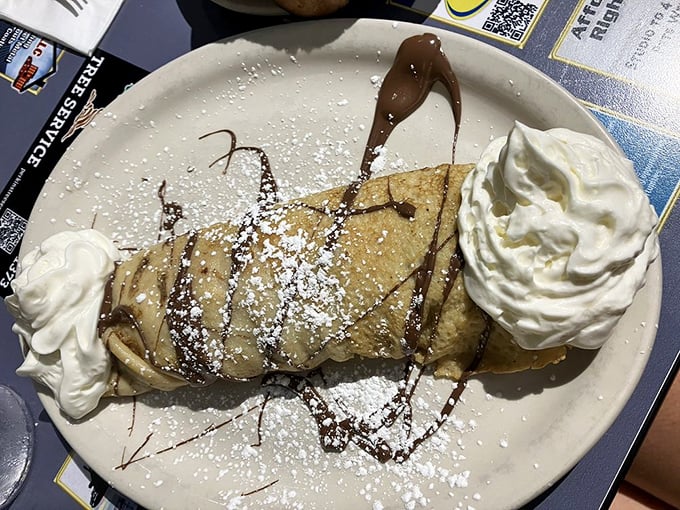 Dessert masquerading as breakfast? This whipped cream-topped crepe with chocolate drizzle doesn't even pretend to be healthy.