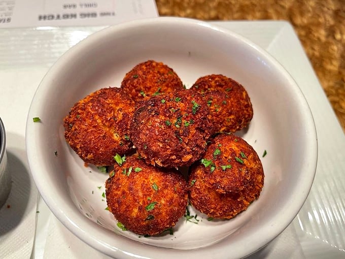 Hush puppies so perfectly golden they deserve their own trophy. Crispy outside, fluffy inside—the unsung heroes of any seafood feast.