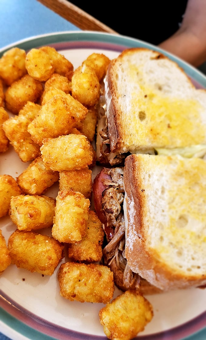 The Cuban sandwich with those perfectly golden tater tots – a lunch combination that makes you question why you ever waste calories on lesser meals.