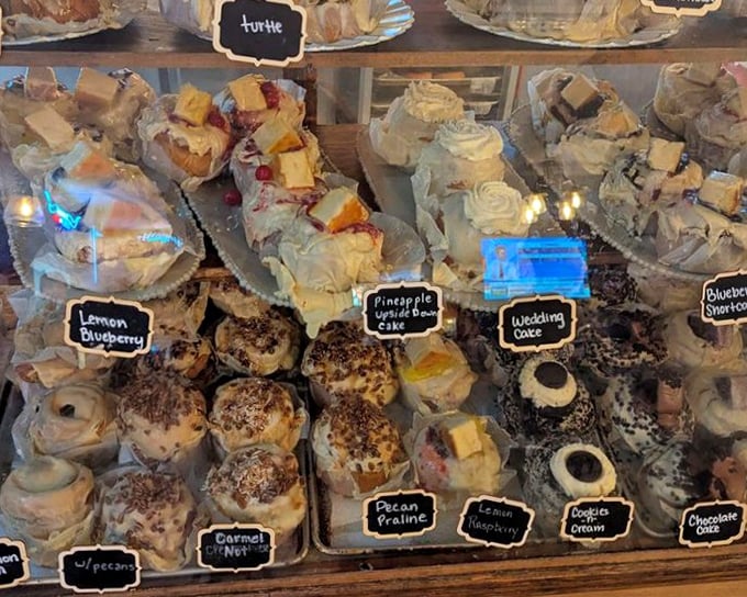 The display case at Gerik's isn't just a bakery showcase—it's a museum of edible art where every piece deserves its own tiny spotlight.