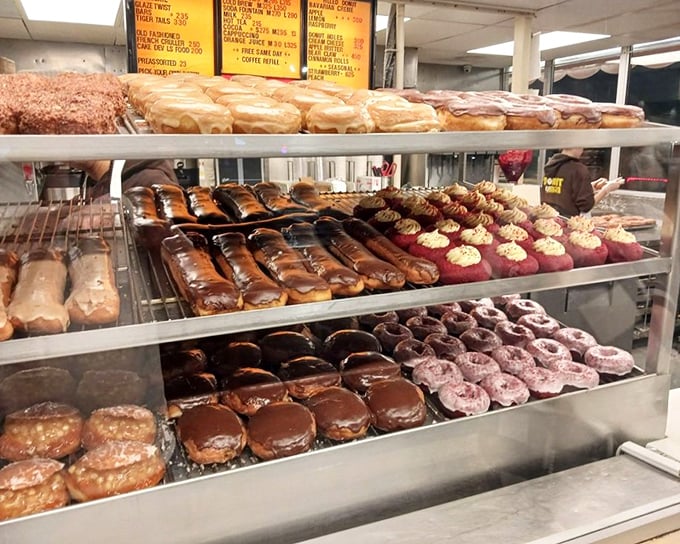 The display case at The Donut Man isn't just a showcase—it's a museum of edible art where glazed masterpieces await adoption.