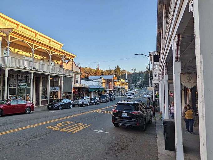 Golden hour bathes Main Street in warm light, highlighting the meticulous preservation that makes Sutter Creek California's time-travel destination of choice.
