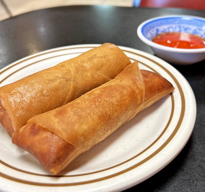 Golden, crispy egg rolls that shatter with each bite, revealing a savory interior. These aren't your 1970s cocktail party appetizers—they're the real deal.