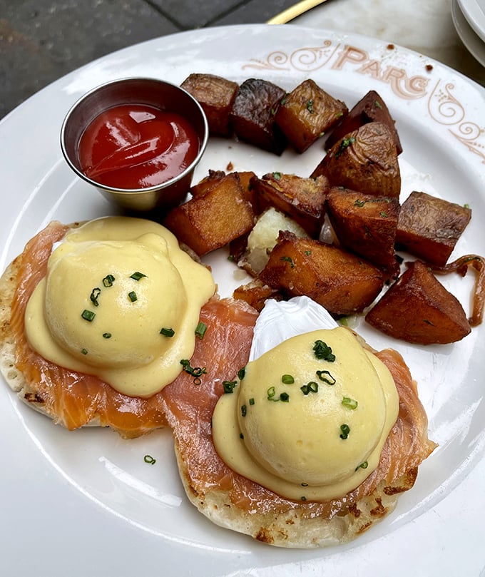 Eggs Benedict gets the Parisian treatment—smoked salmon, hollandaise as yellow as summer sunshine, and potatoes that would make a French grandmother proud.