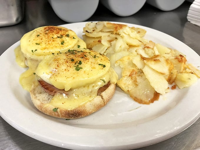 Eggs Benedict that makes you understand why people wait in line on Sunday mornings. That hollandaise sauce isn't just poured—it's draped like fine fabric over breakfast royalty.