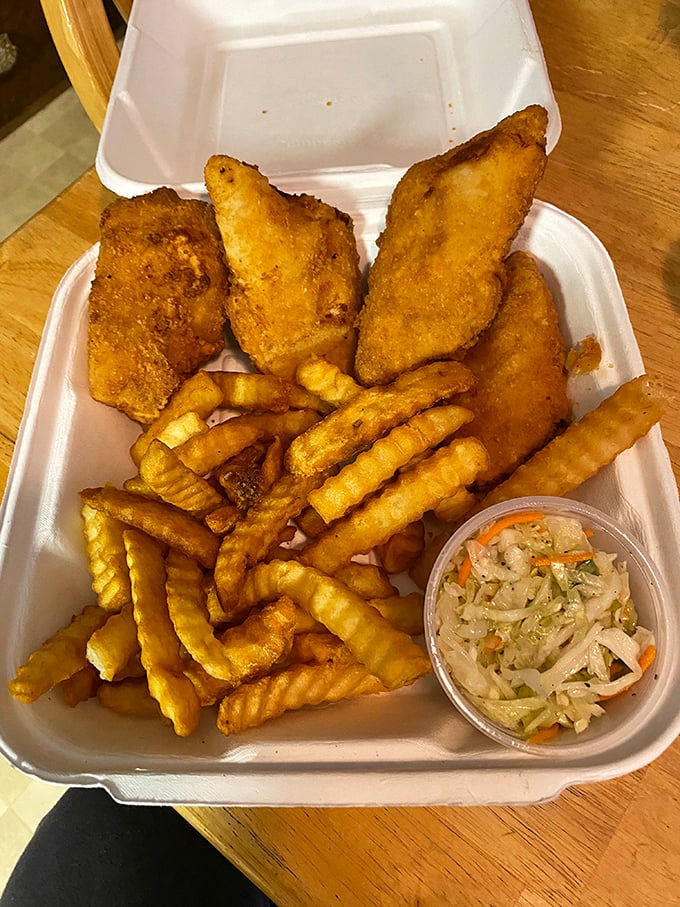 The to-go fish and chips proves some treasures travel well—golden perch fillets, crinkle-cut fries, and coleslaw that isn't an afterthought.