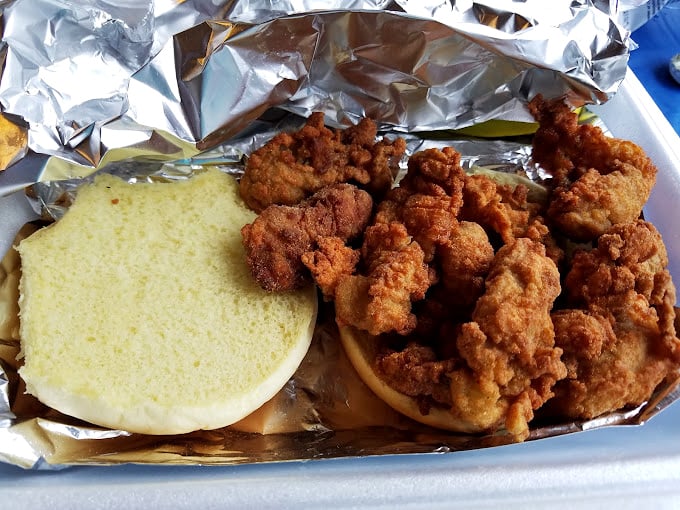This sandwich isn't messing around – it's what happens when the ocean's finest meets a fryer operated by someone who respects seafood.