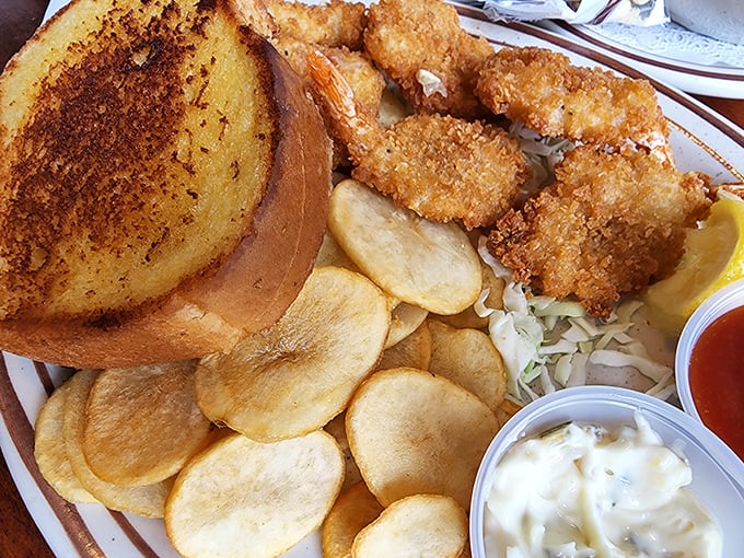 Golden-fried perfection meets house-made chips. That grilled cheese sandwich is the wingman you didn't know your seafood needed.
