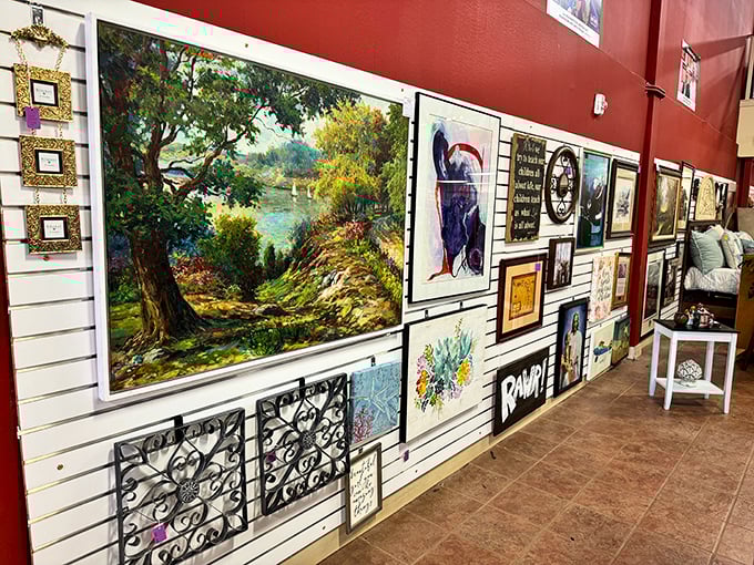Gallery wall goals! One person's discarded artwork becomes another's conversation piece. That landscape would look perfect above your sofa.