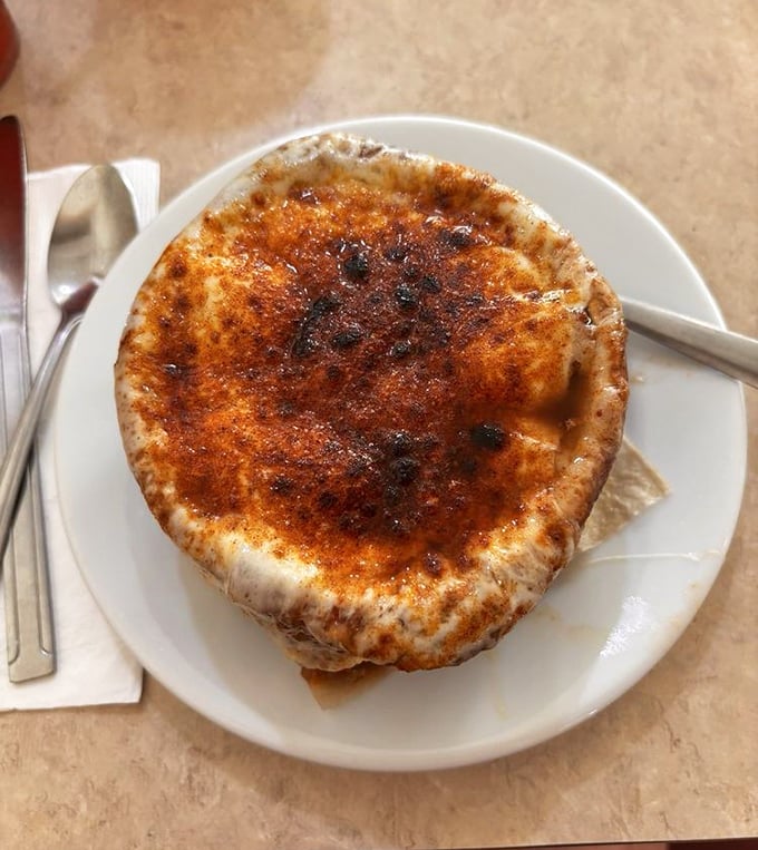 French onion soup with a caramelized crust that requires a satisfying crack of the spoon—like crème brûlée's savory, more substantial cousin.