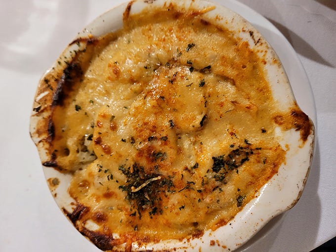 This bubbling French onion soup isn't just a starter—it's a cheese-crowned masterpiece that makes you question why you'd ever need a main course.