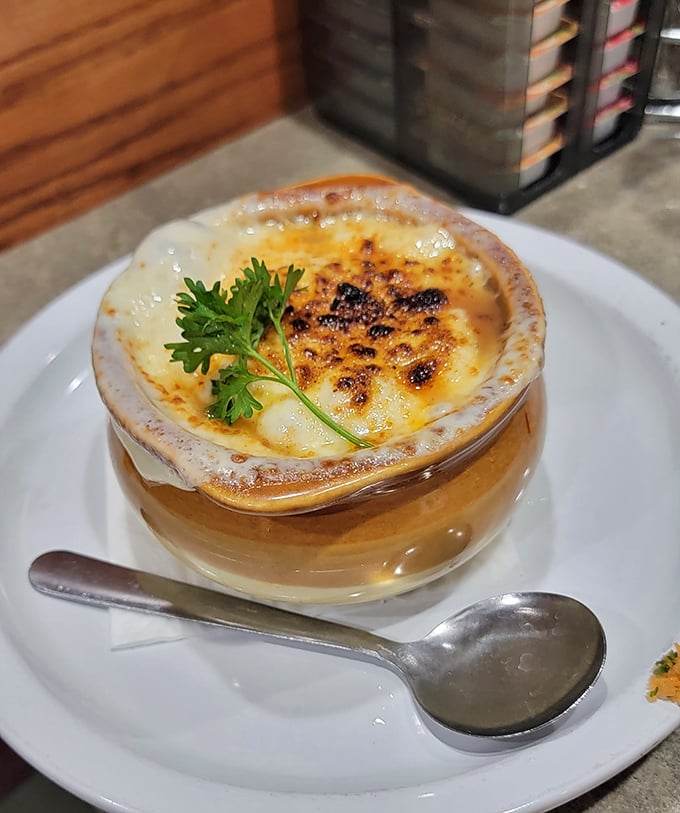 The French onion soup – where cheese meets broth in a relationship so perfect it should have its own romance novel.