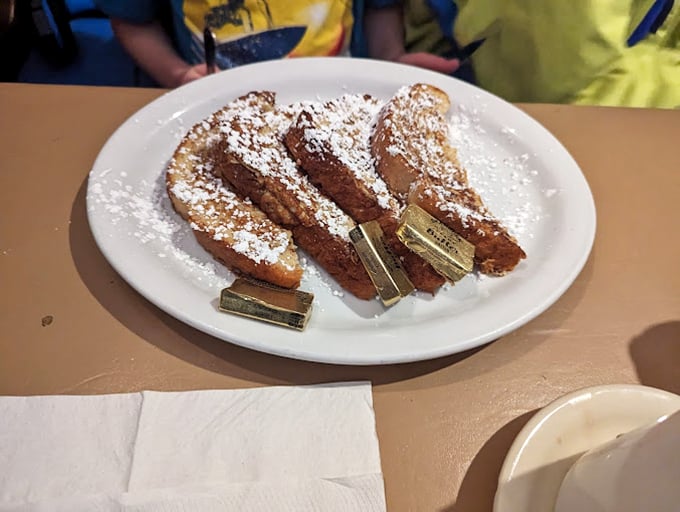 French toast dusted with powdered sugar – proof that sometimes the simplest pleasures are the most satisfying. Sweet dreams are made of this.