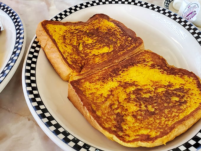 Golden-brown French toast that's crispy outside, custardy inside—the breakfast equivalent of finding money in your winter coat pocket.