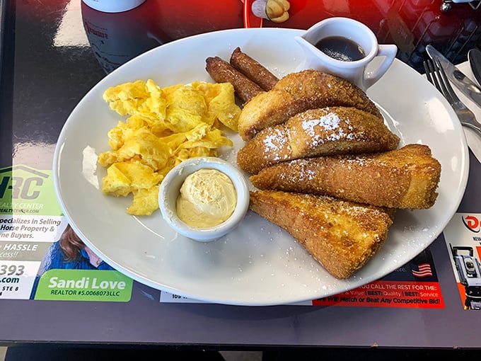 French toast that makes you question every other breakfast you've ever eaten. Paired with eggs and sausage, it's the breakfast trifecta.