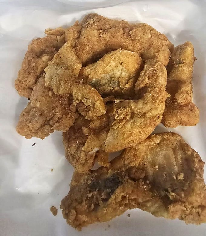 Not your average fish fry. This catfish wears its golden armor with pride, ready to convert even the most dedicated chicken loyalists.