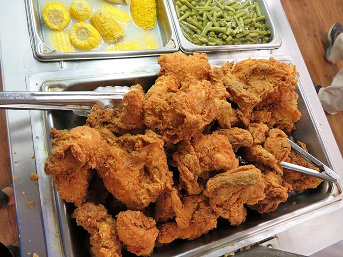 The star of the show – golden fried chicken piled high, each piece promising that perfect crunch followed by juicy tenderness within.