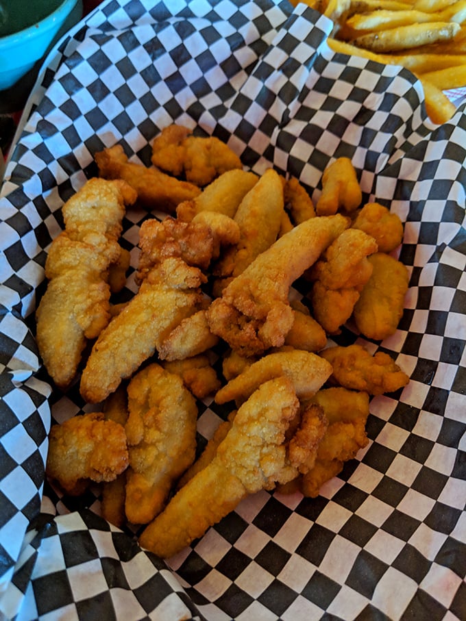 Golden fried clams that look like tiny treasure nuggets from the sea, crispy outside and tender within – pure perfection.