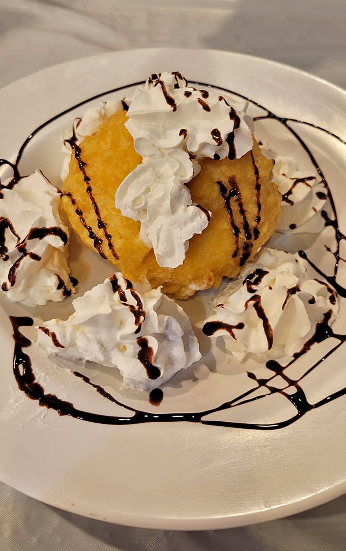 Fried ice cream that defies physics—hot, crispy exterior giving way to cool, creamy center. Dessert magic that makes you question everything you thought you knew.