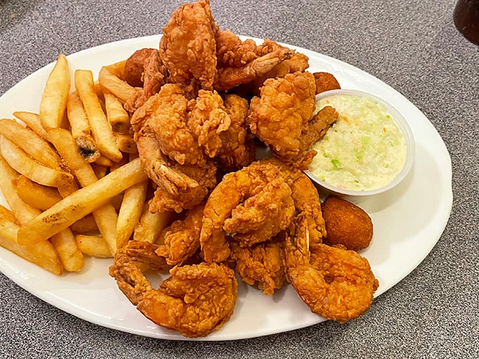 These golden-fried shrimp aren't just cooked—they're transformed. Crispy exterior giving way to that perfect snap that makes you close your eyes in appreciation.